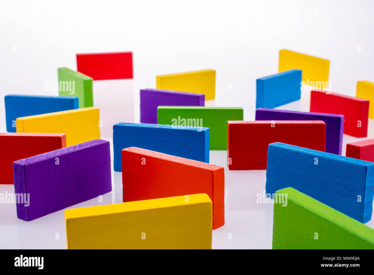 Color dominoes on a white background Stock Photo - Alamy