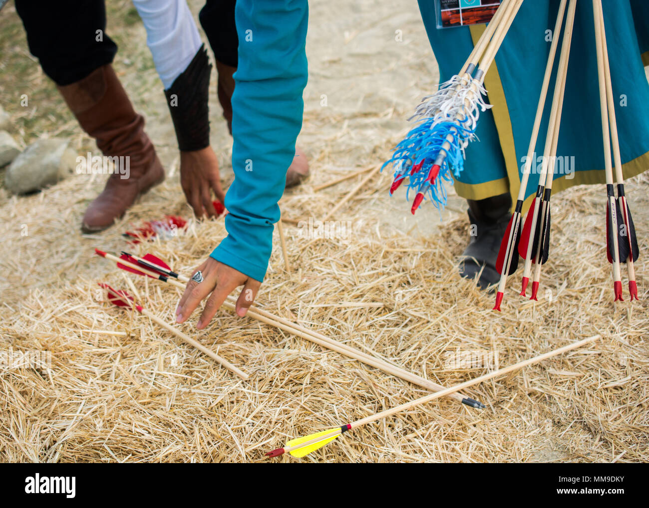 Arrow in hand as rprojectile weapon system archery Stock Photo - Alamy