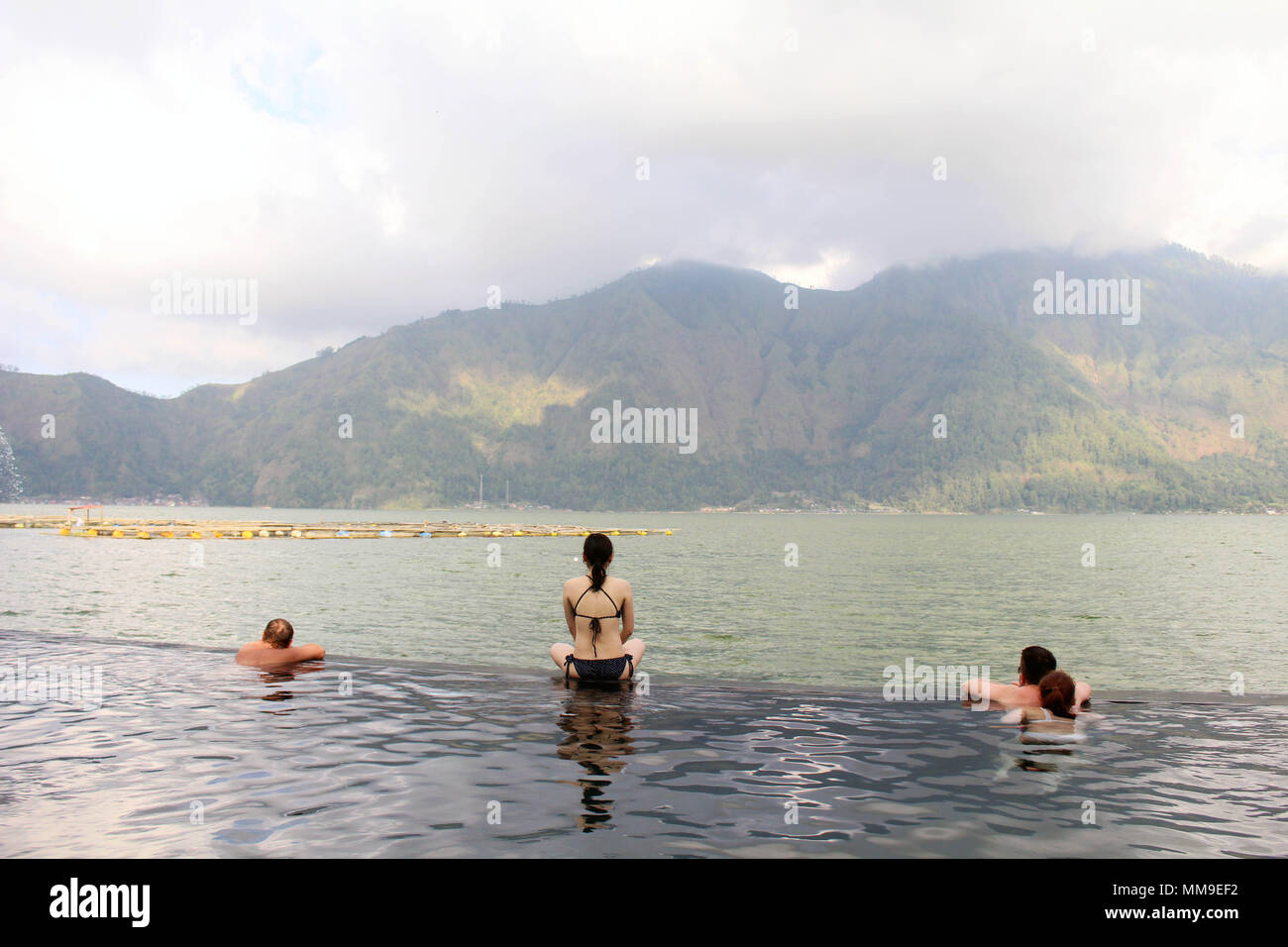 A hotspring in Bali (Toya Devasya), by the lake, facing a mountain ...