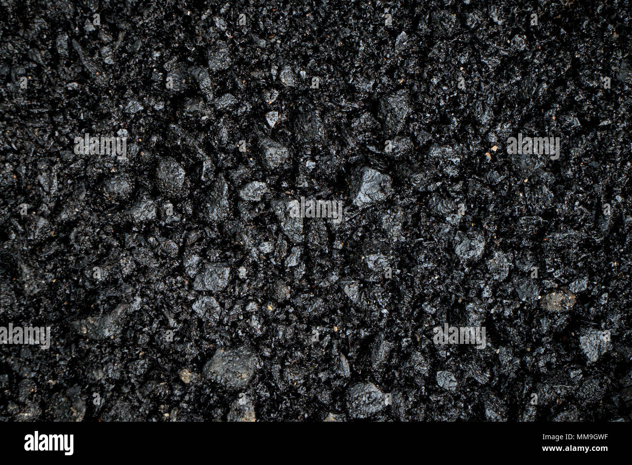 Photo of close up new asphalted surface background Stock Photo - Alamy