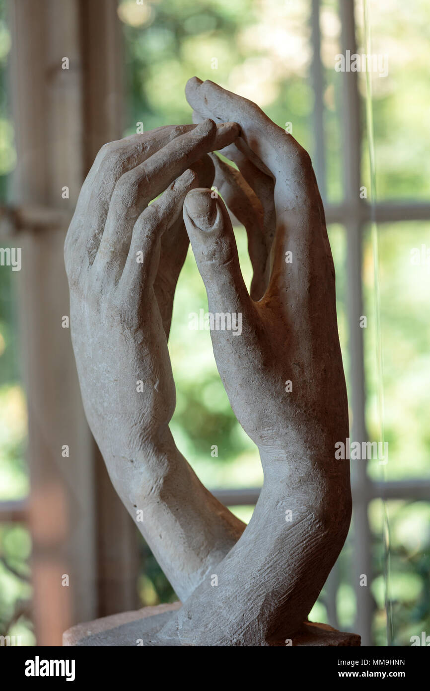 Paris - Museum Rodin. Sculpture of the Cathedral is a combination of ...