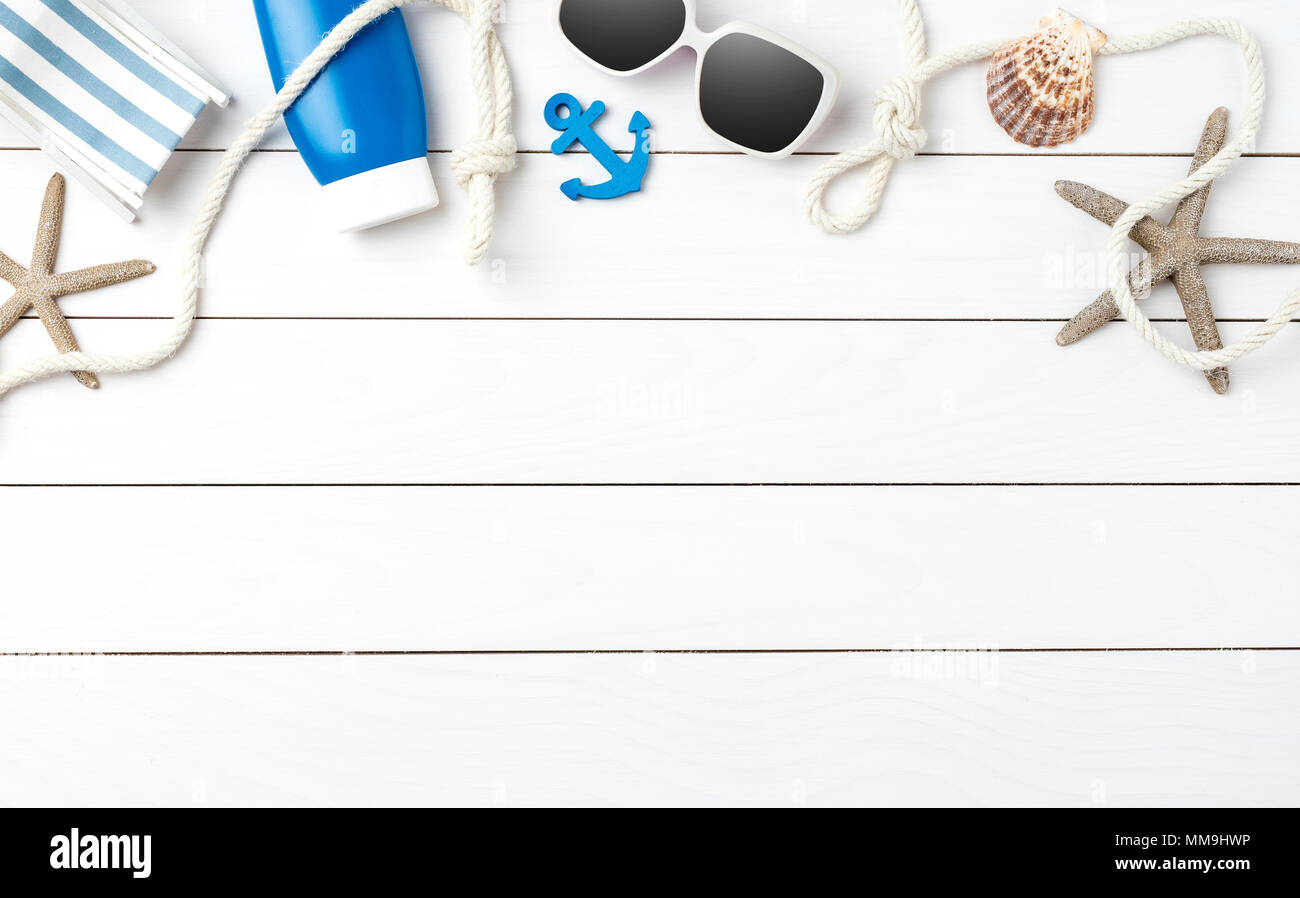 Summer background on white wooden table Stock Photo - Alamy