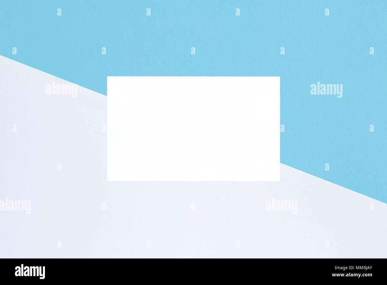 Blank white card on blue white pastel color paper of minimal retro ...