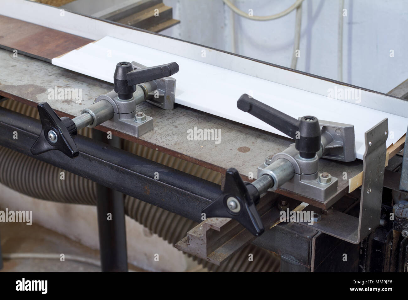 Press bonding. metal glue press for wood frame on fixed table Stock ...