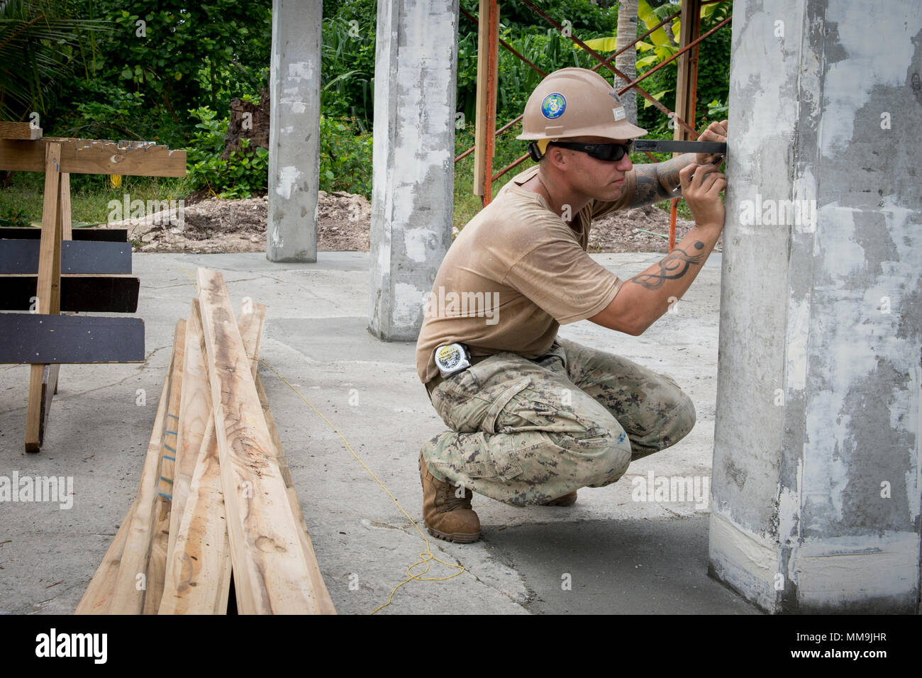 Utilitiesman 3rd Class Andrew Potter, assigned to Naval Mobile ...