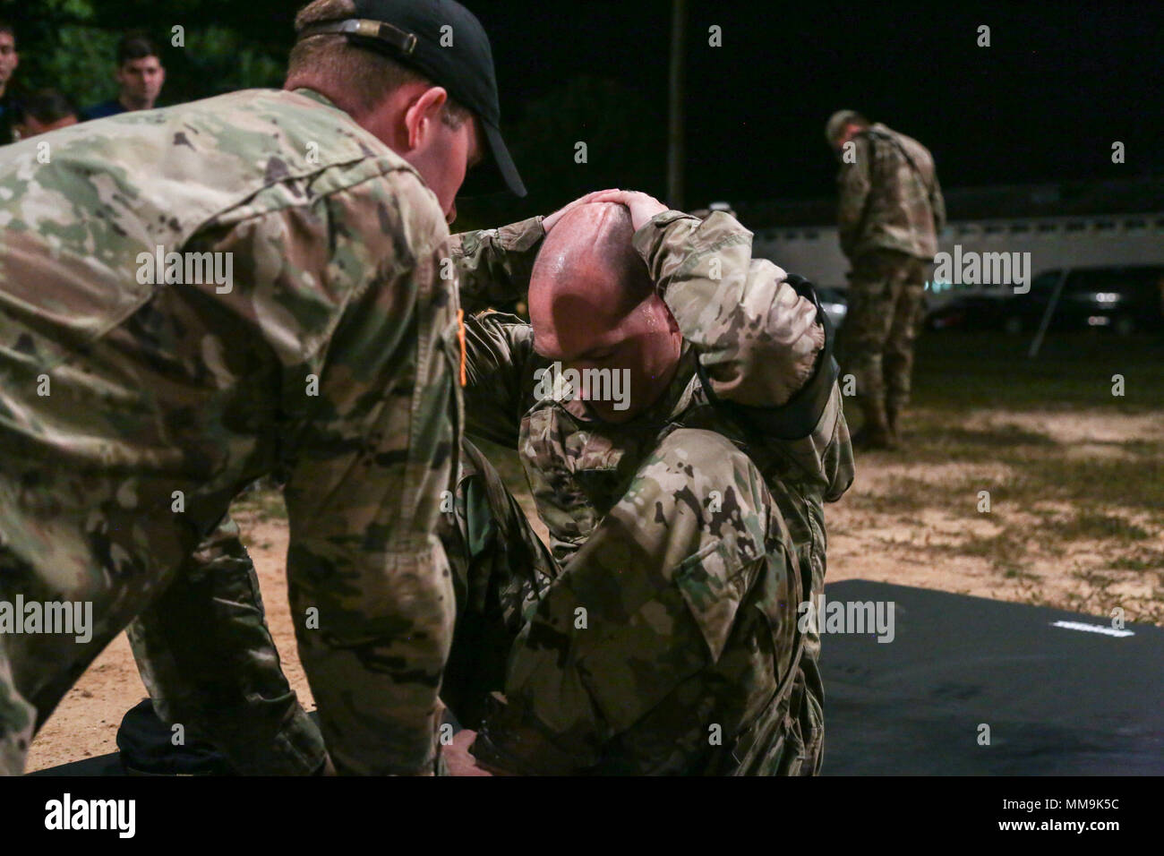 U.S. Soldier demonstrates the sit-ups event before the Army Physical ...