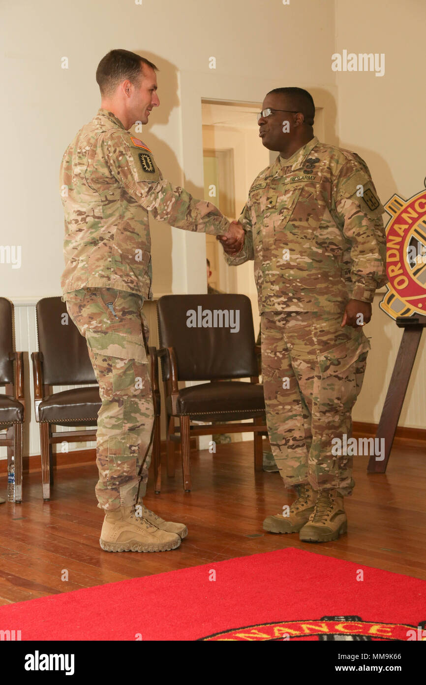 U.S. Soldiers shakes hands with Brig. Gen. David Wilson, the 40th Chief ...