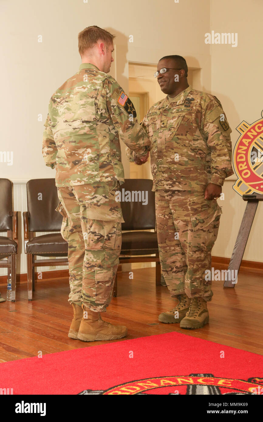 U.S. Soldiers shakes hands with Brig. Gen. David Wilson, the 40th Chief ...