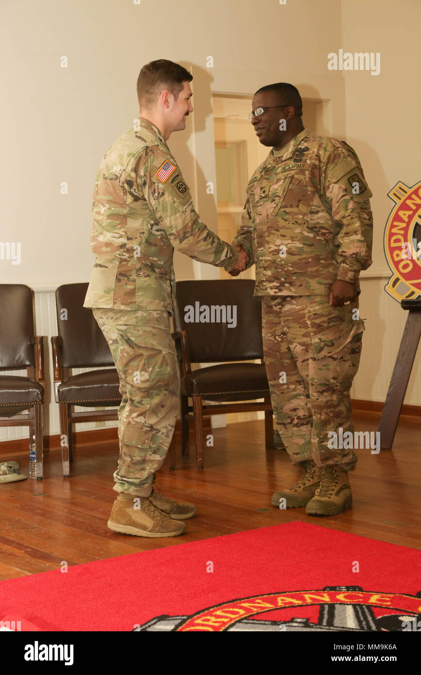 U.S. Soldiers shakes hands with Brig. Gen. David Wilson, the 40th Chief ...