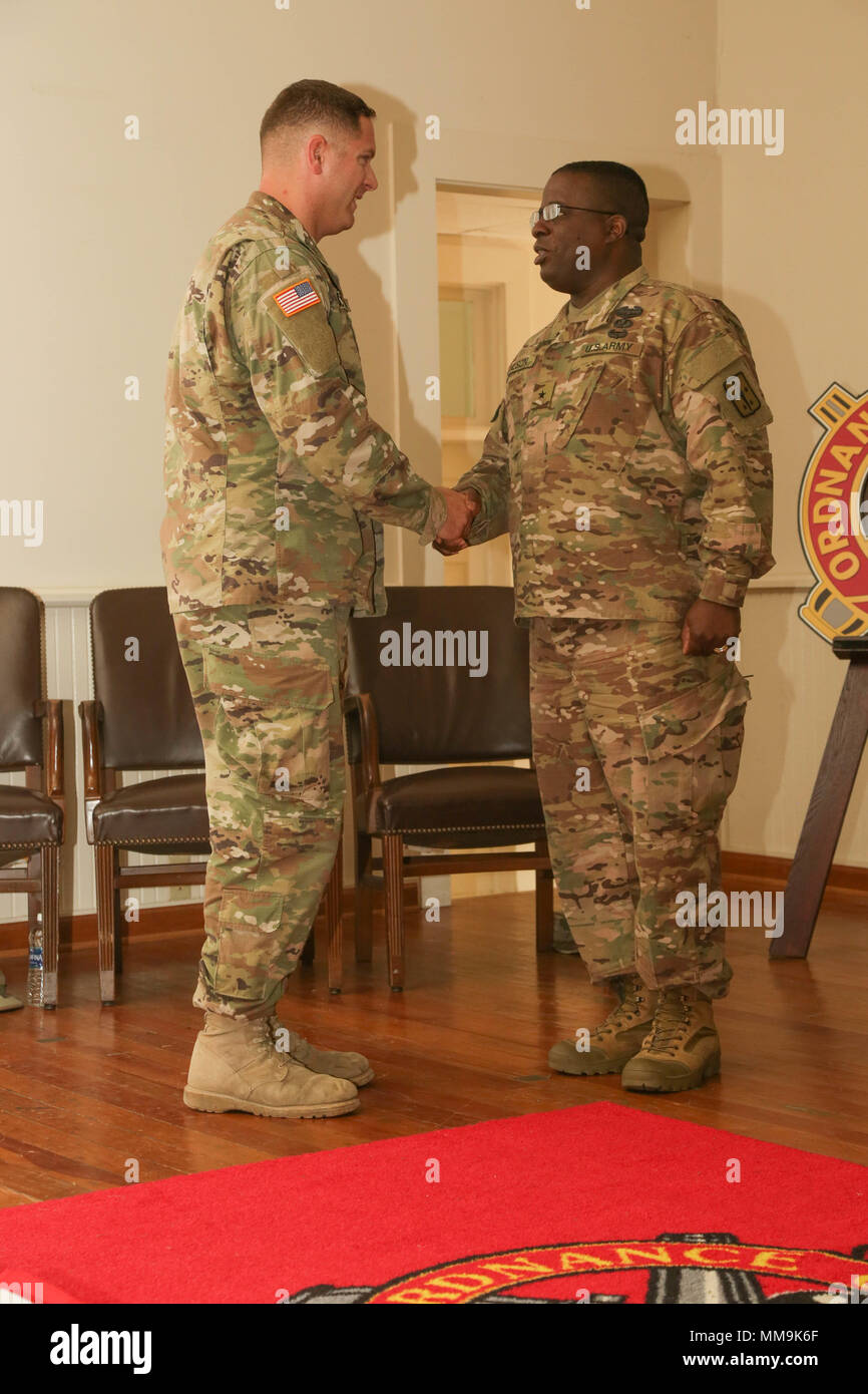 U.S. Soldiers shakes hands with Brig. Gen. David Wilson, the 40th Chief ...