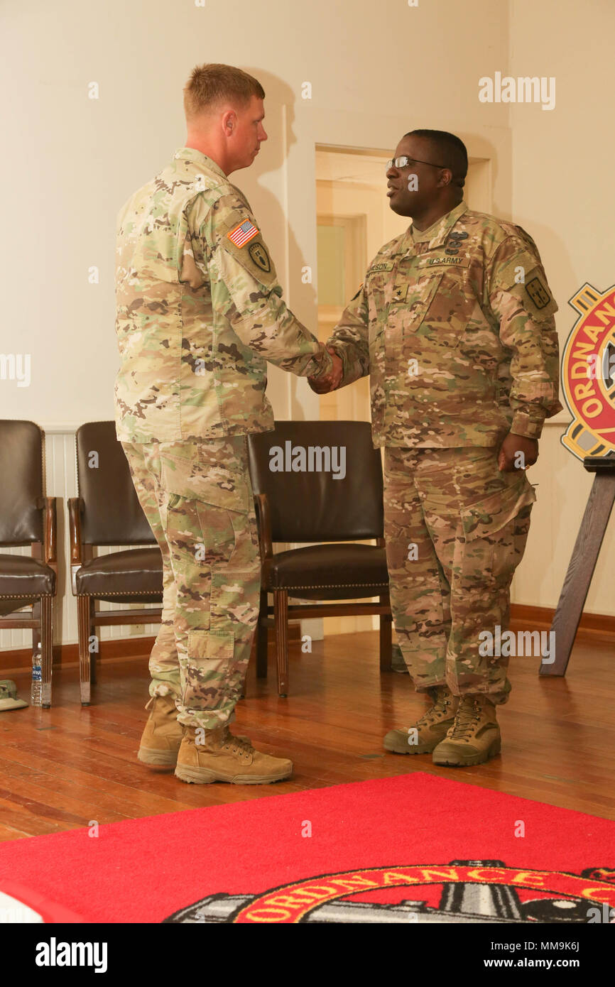 U.S. Soldiers shakes hands with Brig. Gen. David Wilson, the 40th Chief ...