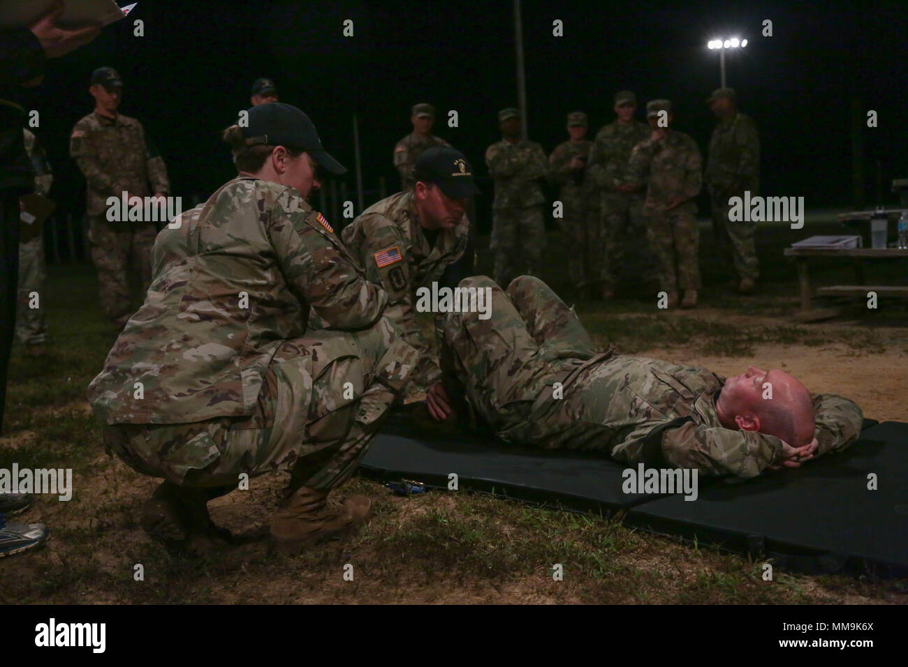 U.S. Army Explosive Ordnance Disposal Instructors demonstrate the situp ...