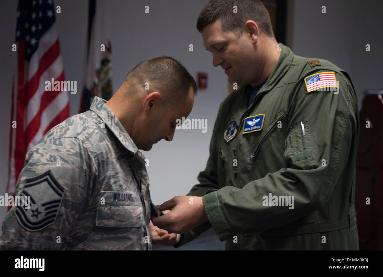 U.S. Air Force Maj. Ben L. Simerman II (right), the chief of safety ...