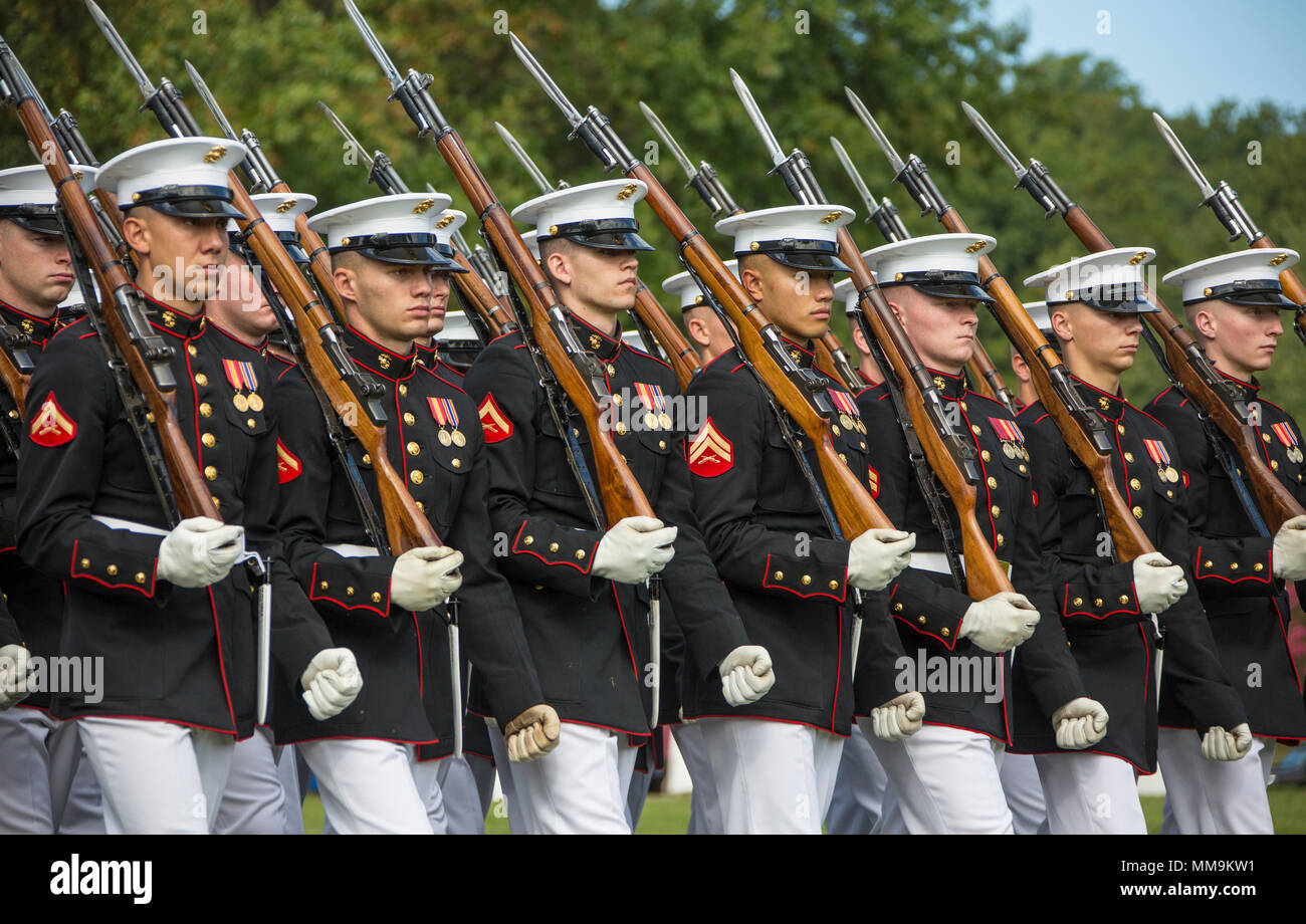U.S. Marines with the Silent Drill Platoon march during the U.S. Marine ...