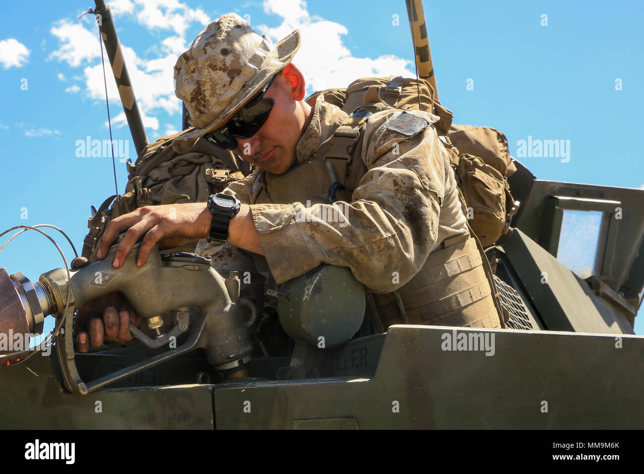 U.S. Marines with Company D, 1st Light Armored Reconnaissance Battalion, 1st Marine Division ...
