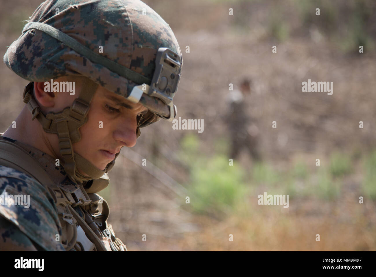 U.S. Marine Corps Lance Cpl. Kyle Lynch, a combat engineer with Bravo Company, 7th Engineer ...