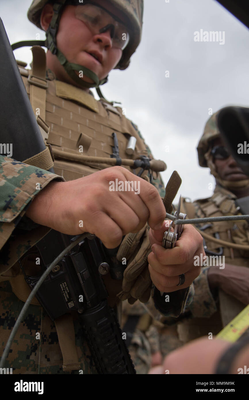 U.S. Marine Corps Pfc. Isaiah Toone, a combat engineer with Bravo ...