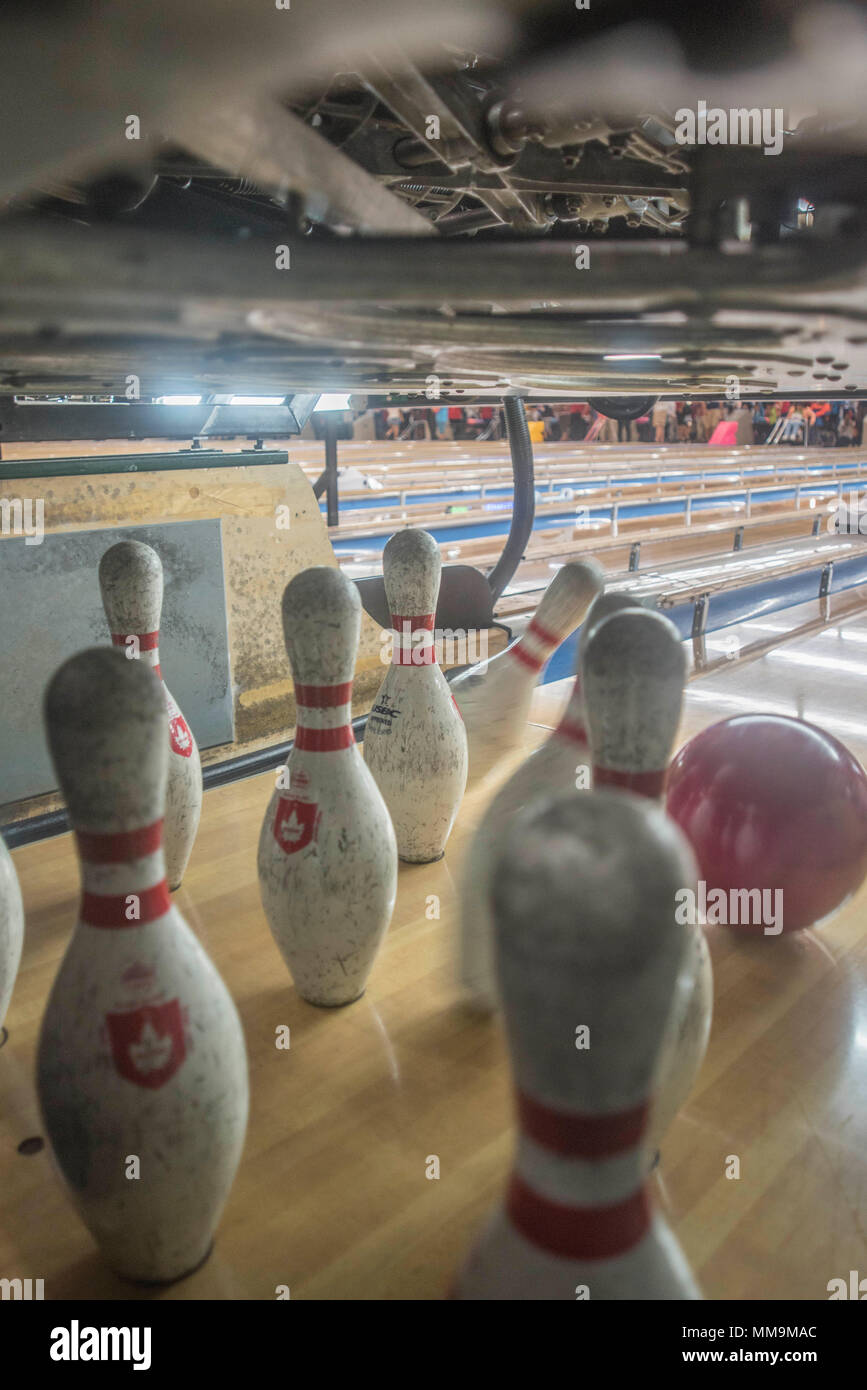 A bowling ball strikes pins during the 13th annual Kadena Special ...