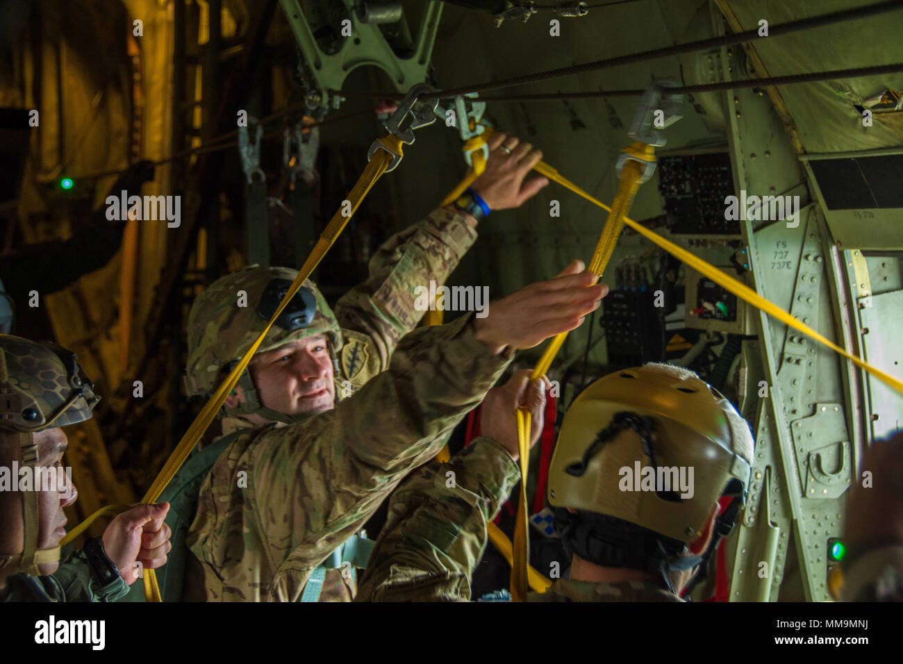 A Jumpmaster assigned to 1st Battalion, 10th Special Forces Group ...
