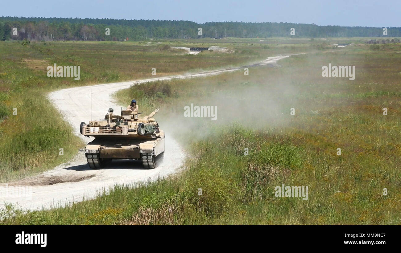 Marines operate an M1A1 Abrams tank during a gunnery range at Camp ...