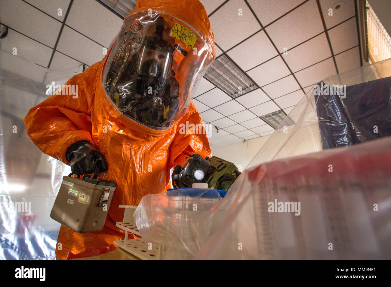 U.S. Army Survey Team member Staff Sgt. Nicky Lam, 21st Weapons of Mass ...