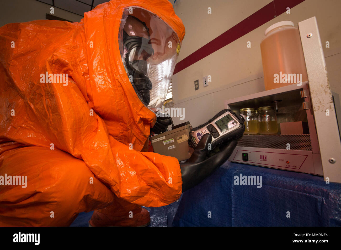 U.S. Army Survey Team member Staff Sgt. Nicky Lam, 21st Weapons of Mass ...