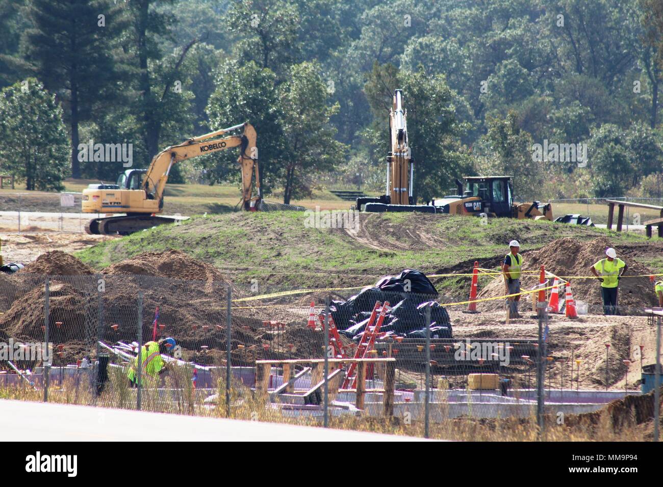 Workers with Catamount Constructors, Inc. of Lakewood, Colo., continue ...