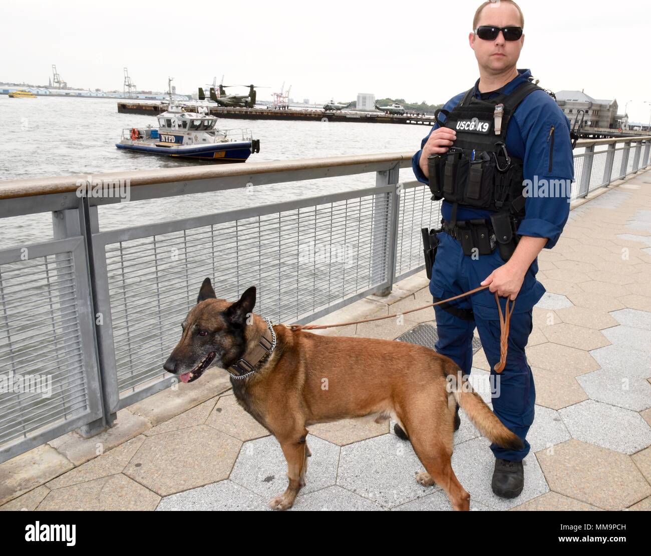 Petty Officer 1st Class Nick Antis, a dog handler with Marine Safety ...