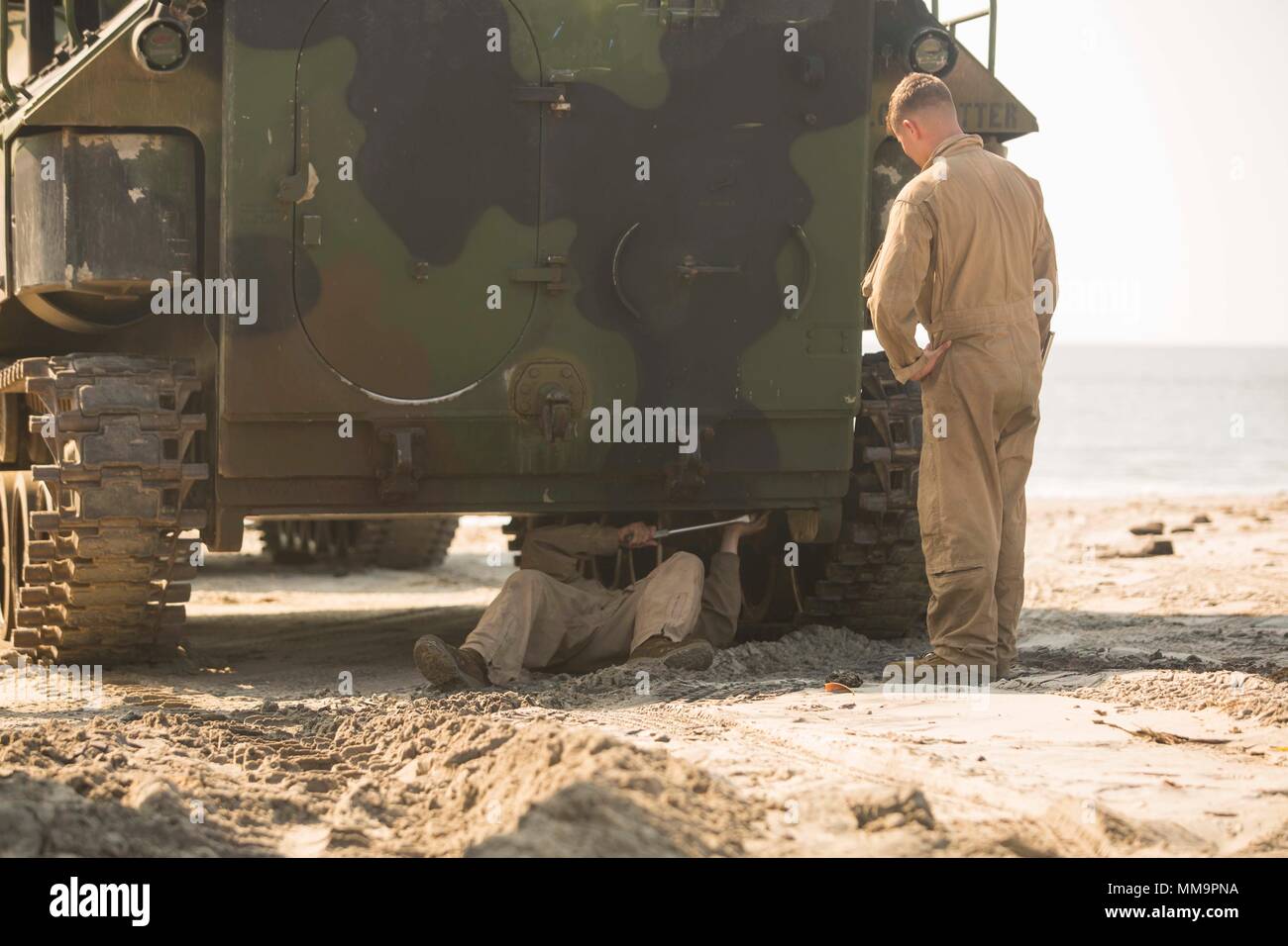 Marines with 2nd Assault Amphibian Battalion prepare their vehicles to ...