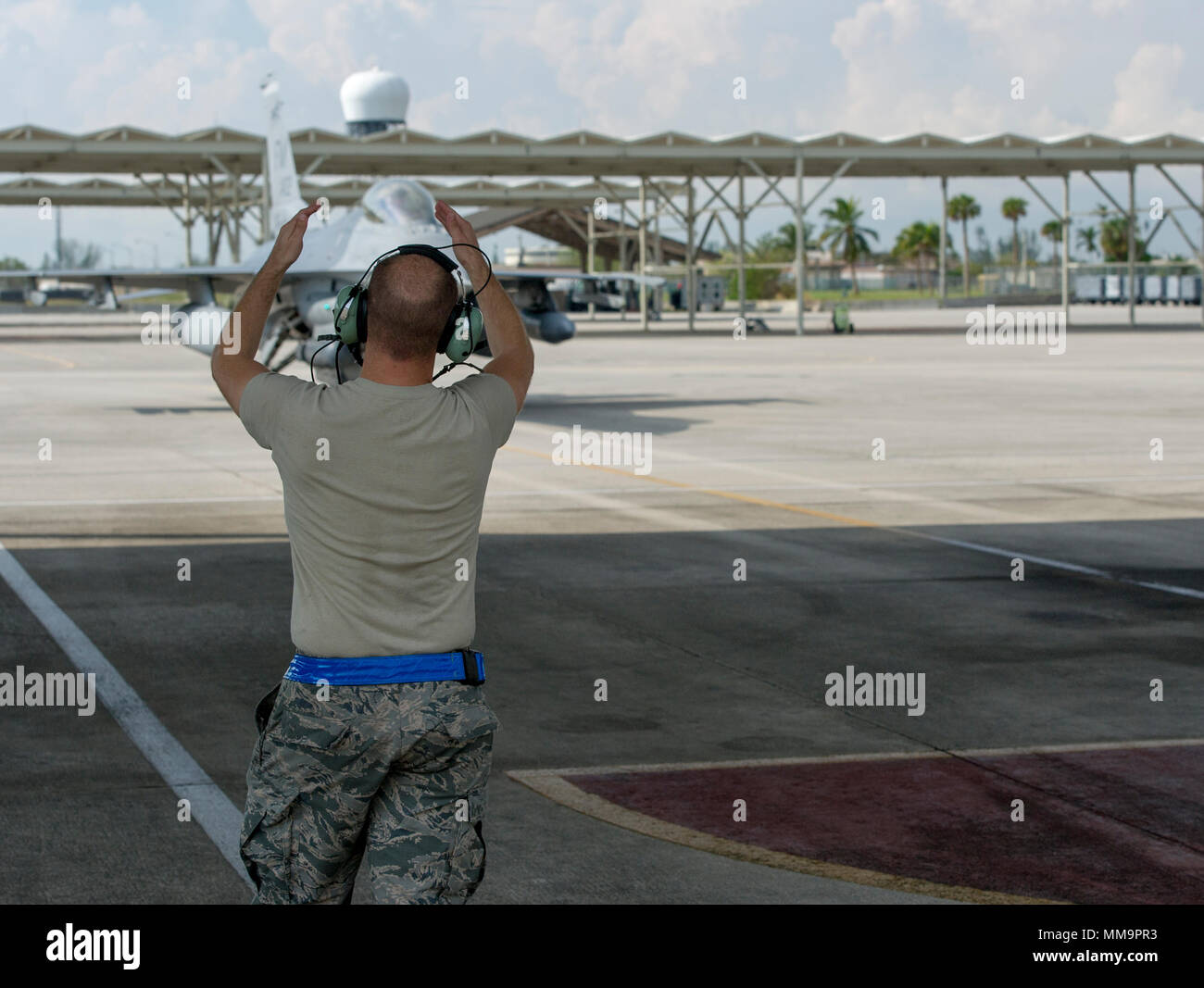 A Reserve Citizen Airmen crew chief from the 482 Aircraft Maintenance ...