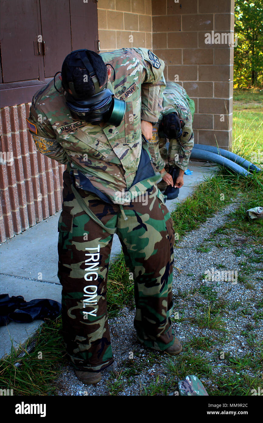 Arizona National Guardsman Spc. Justin Martinez races the clock to don ...