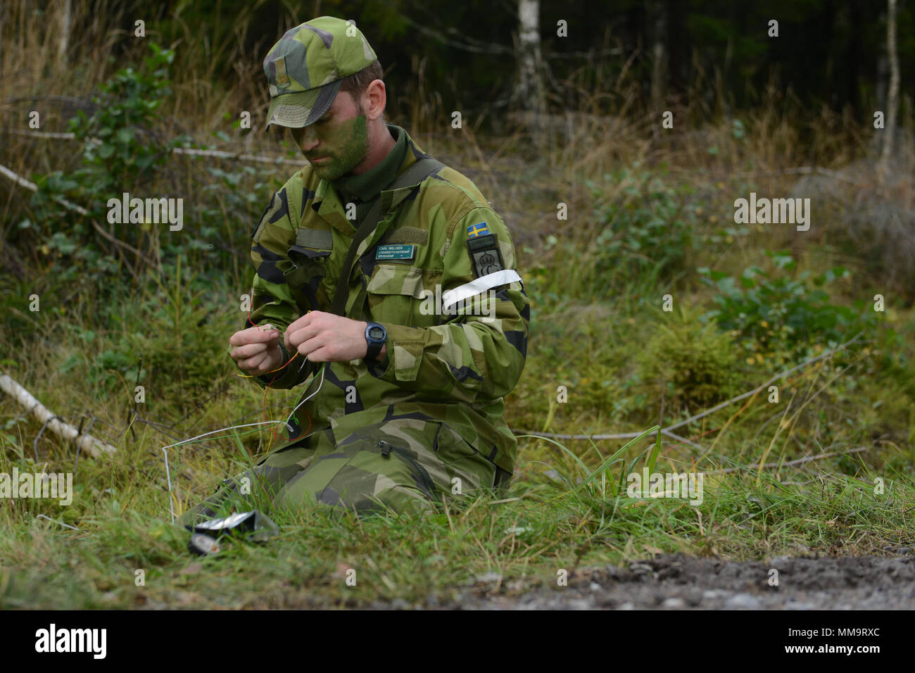 Swedish Engineers of the 12th Motorized Battalion set demolitions as ...