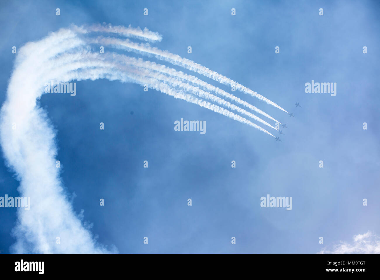 The U.S. Navy Blue Angels perform an inverted flight maneuver during ...