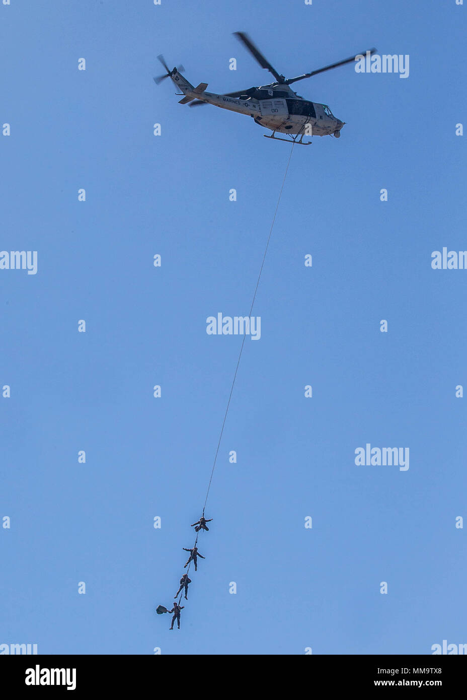 A UH-1Y Huey with the 3rd Marine Aircraft Wing lifts Marines with 1st ...