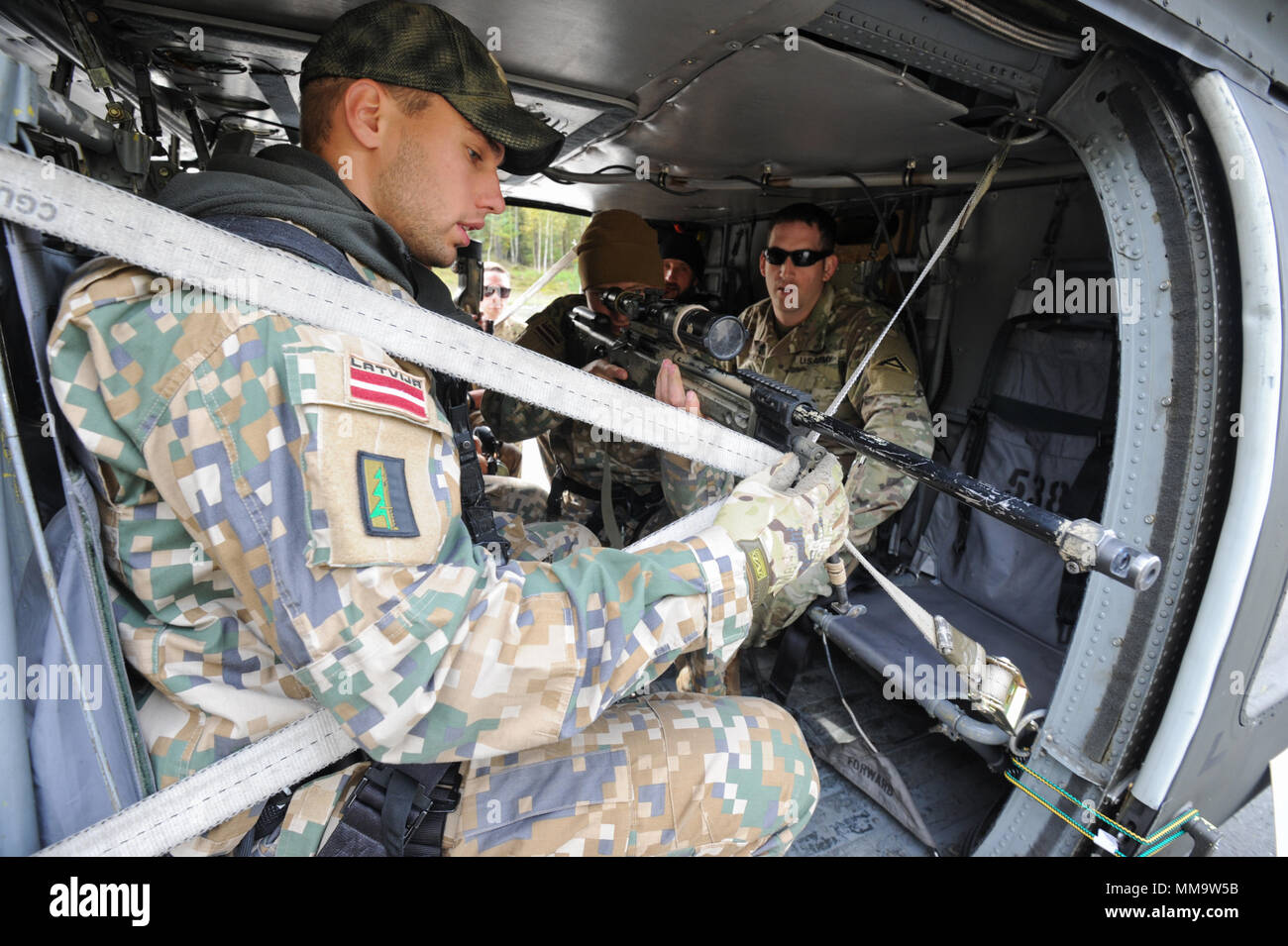 U.S. Army Sgt. 1st Class Ryan Meek (right) with the 7th Army Training ...
