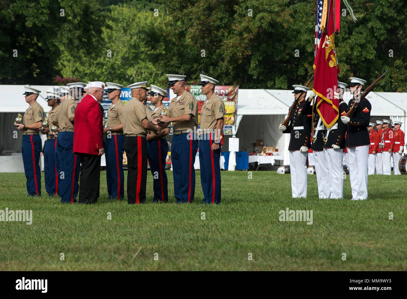 U.S. Marine Corps Gunnery Sgt. Mark Koerner receives the Marine Combat ...