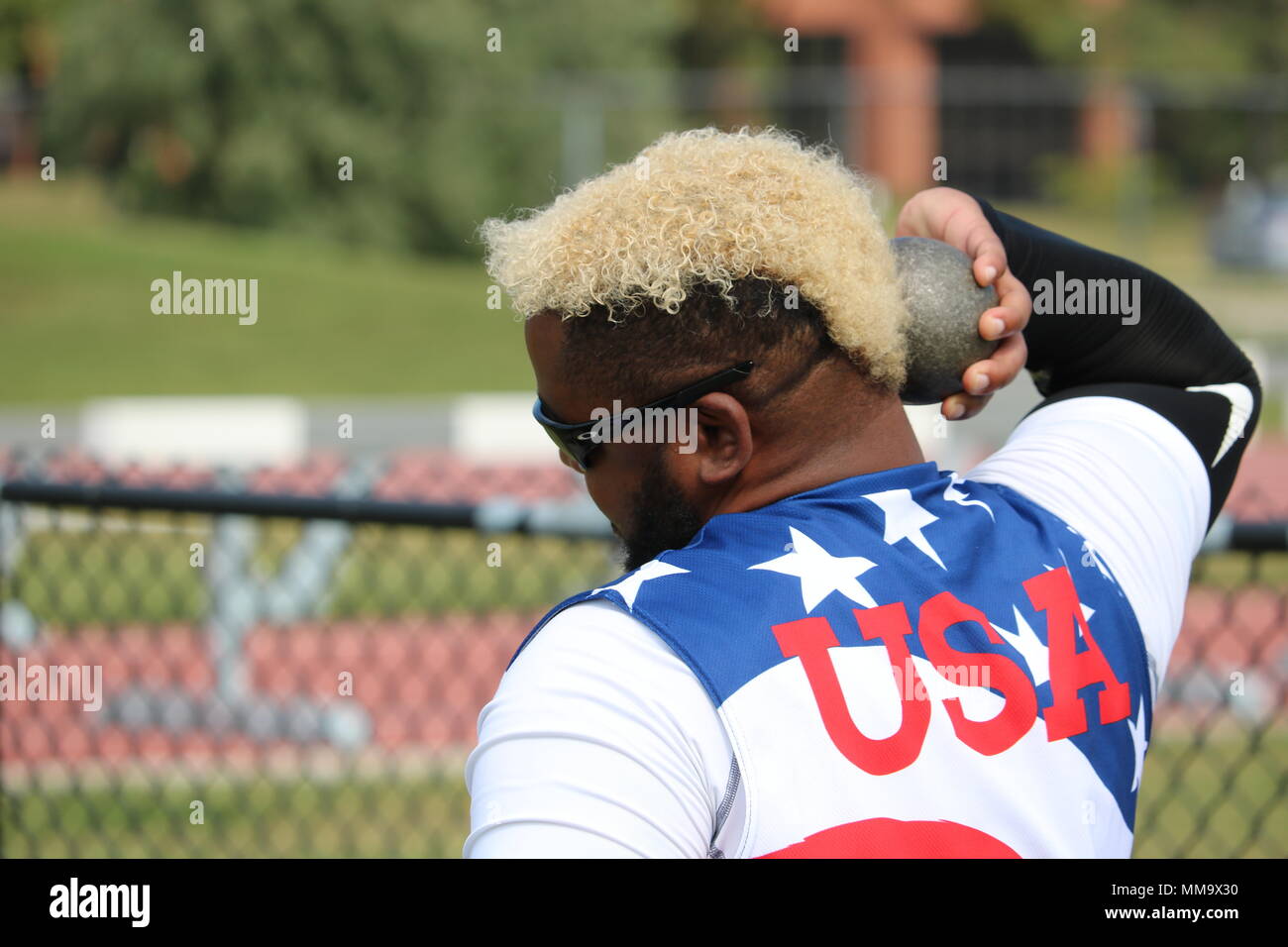 U.S. Army veteran Bobby Green works on his shot put technique ...