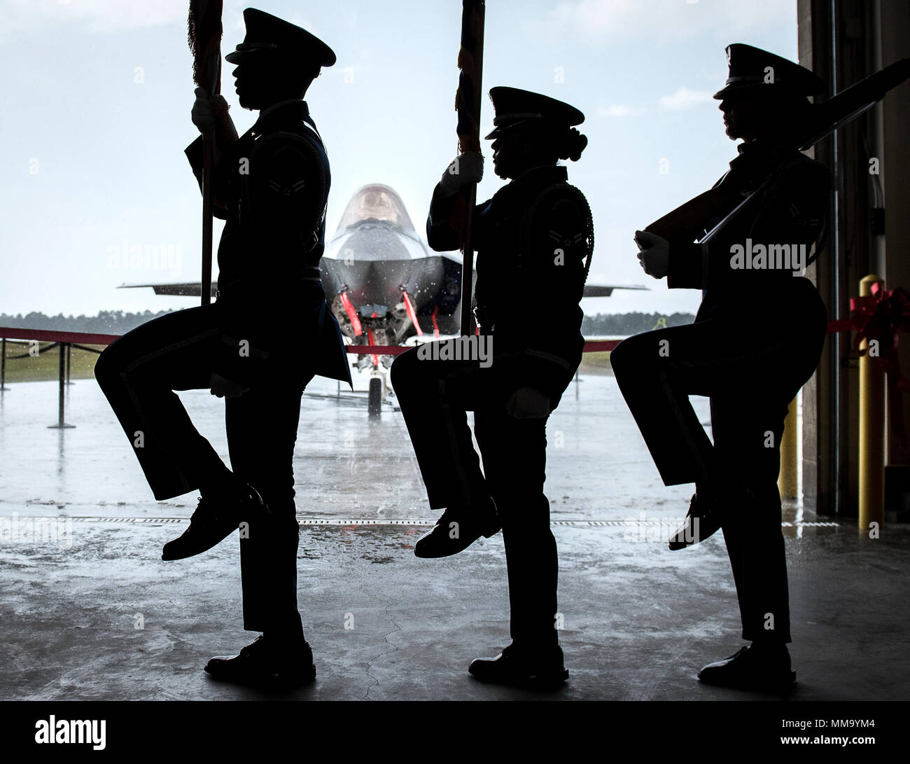 Team Eglin Honor Guard Airmen bring in the colors during the new fire ...