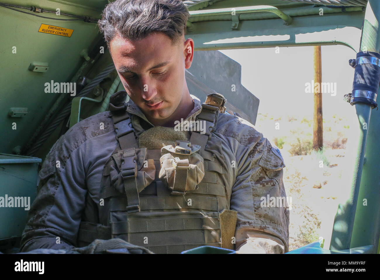 A U.S. Marine with 3rd Light Armored Reconnaissance Battalion, 1st ...