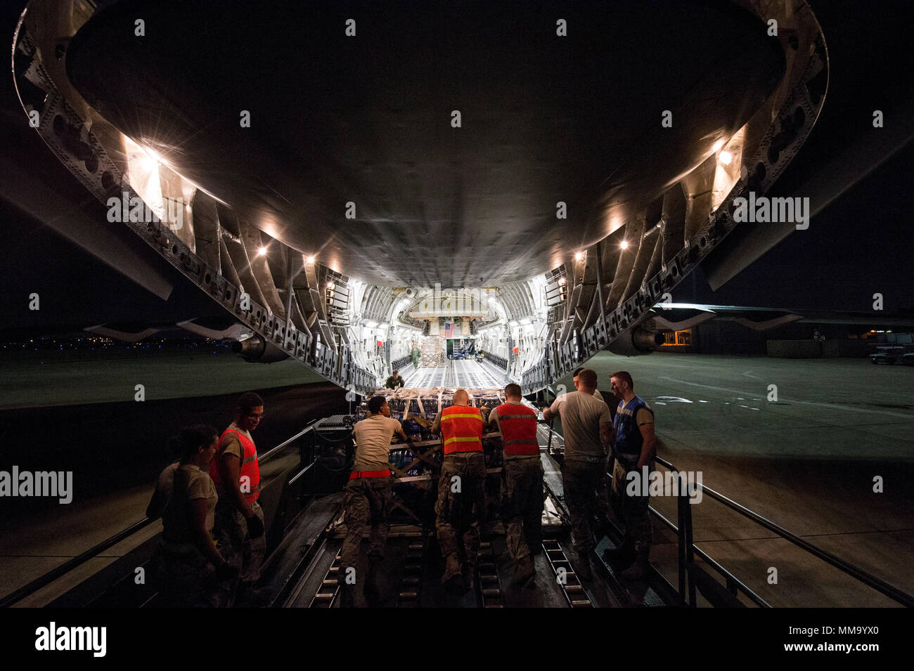 U.S. Air Force members from the 3rd Airlift Squadron, 502nd Logistics ...