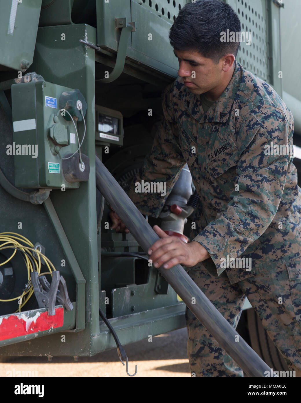 U.S. Marine Corps Cpl. Helmer Gomez, a semitrailer refueler operator ...