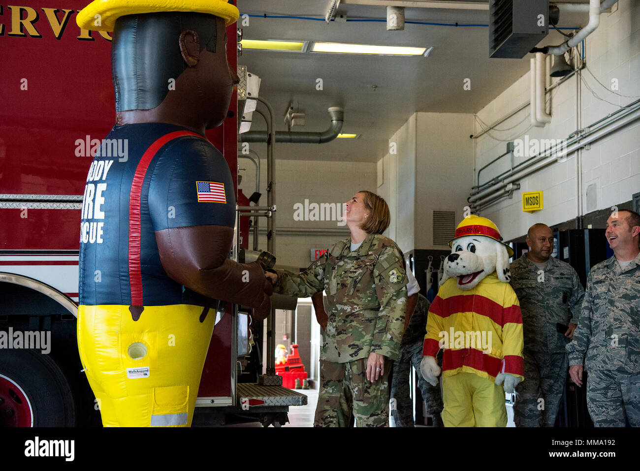 U.S. Air Force Col. Jennifer Short, 23d Wing commander, shakes hands ...