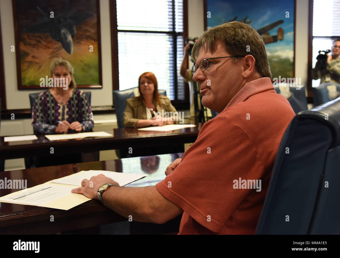 Kenneth Dodd, 81st Training Wing historian, portrays a reporter asking ...