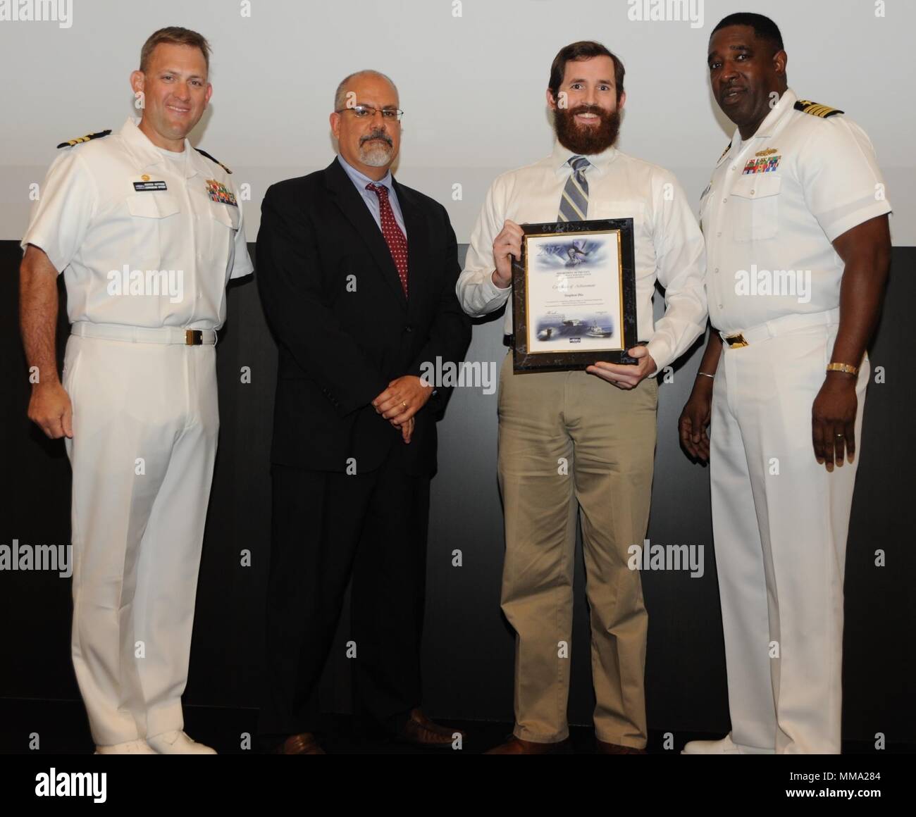 DAHLGREN, Va. - Stephen Dix receives his certificate of achievement ...