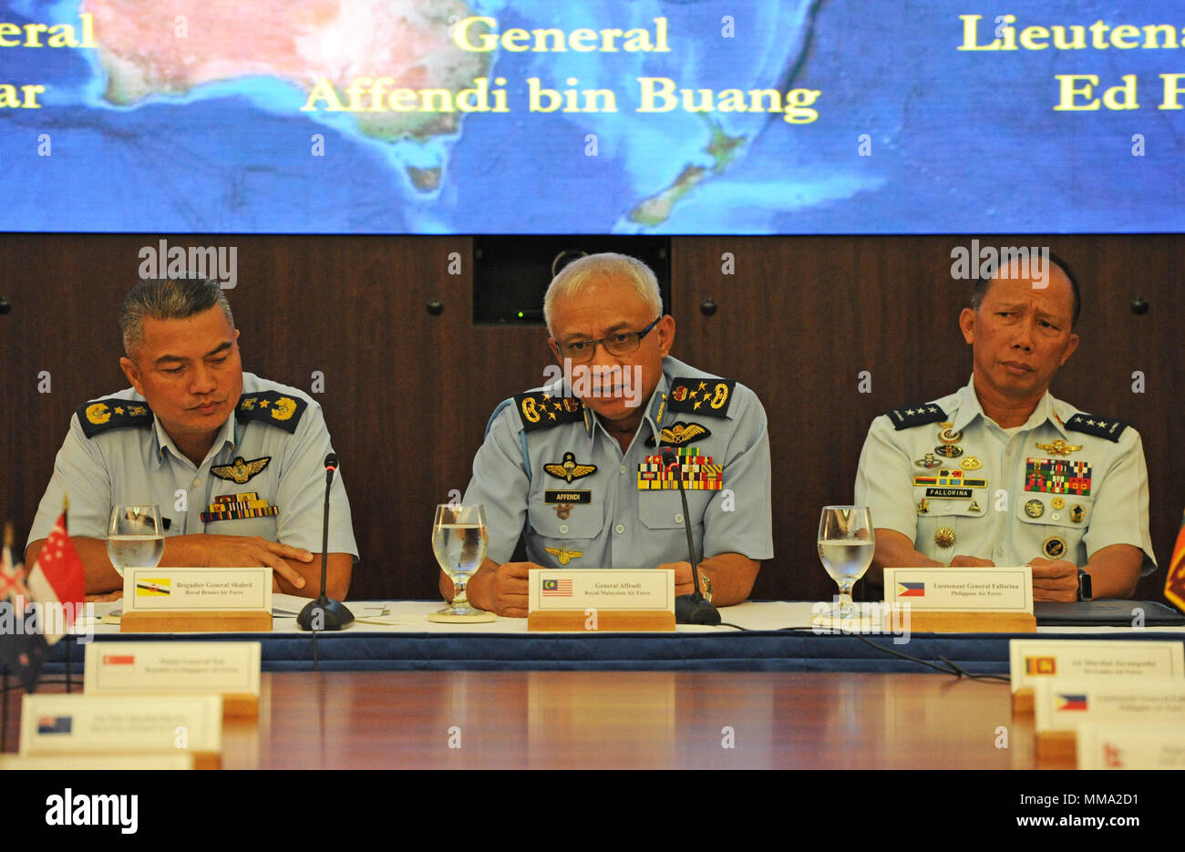 Royal Brunei Air Force Brig. Gen. Shahril Anwar, left, Royal Malaysian ...