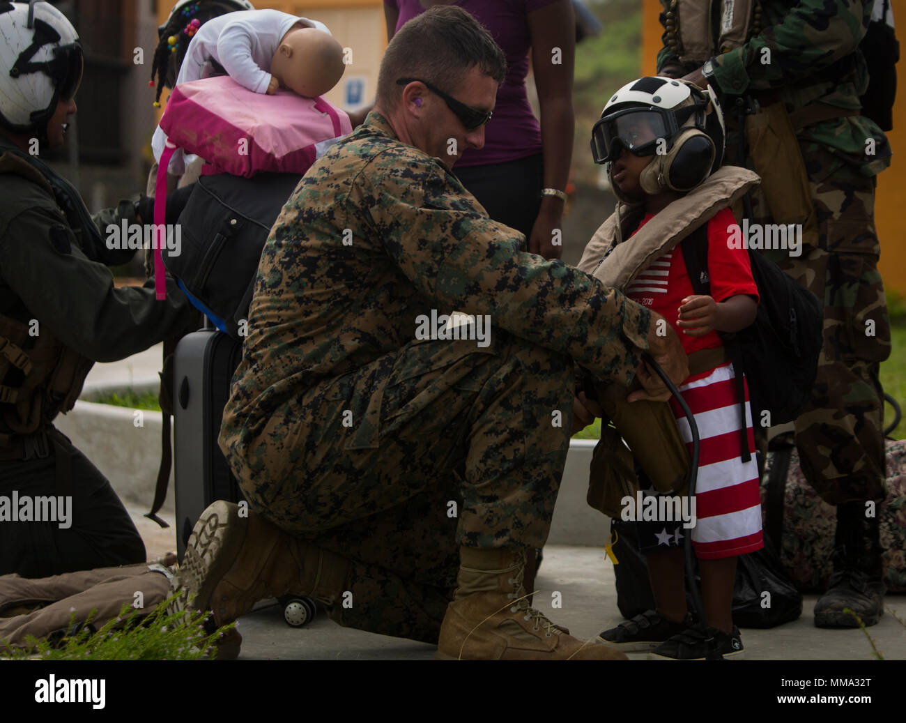 U.S. Marine Gunnery Sgt. Joshua Locke, with Joint Task Force - Leeward ...