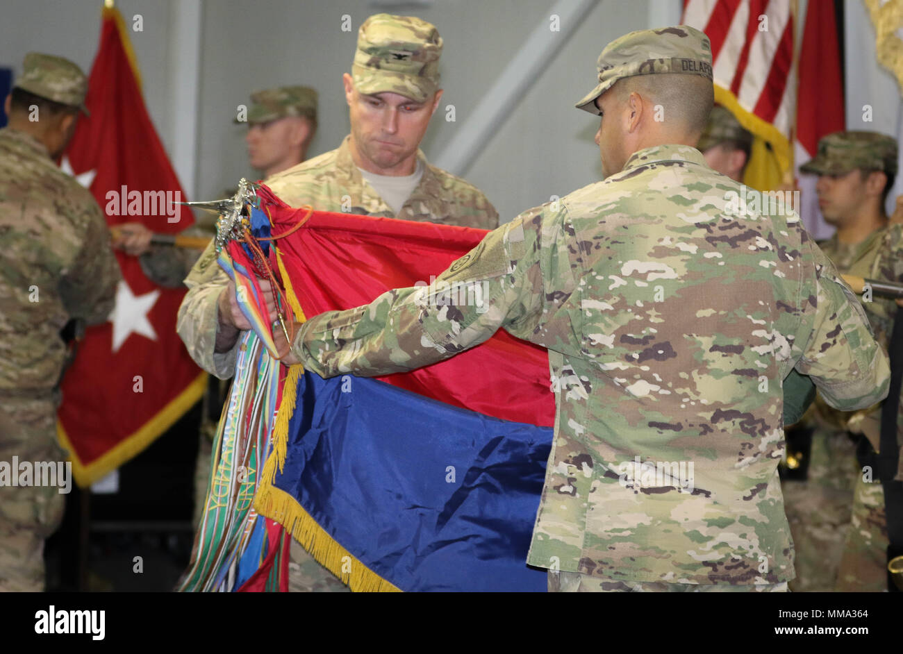 U.S. Army Col. Pat Work (left) and Command Sgt. Maj. Randolph Delapena ...