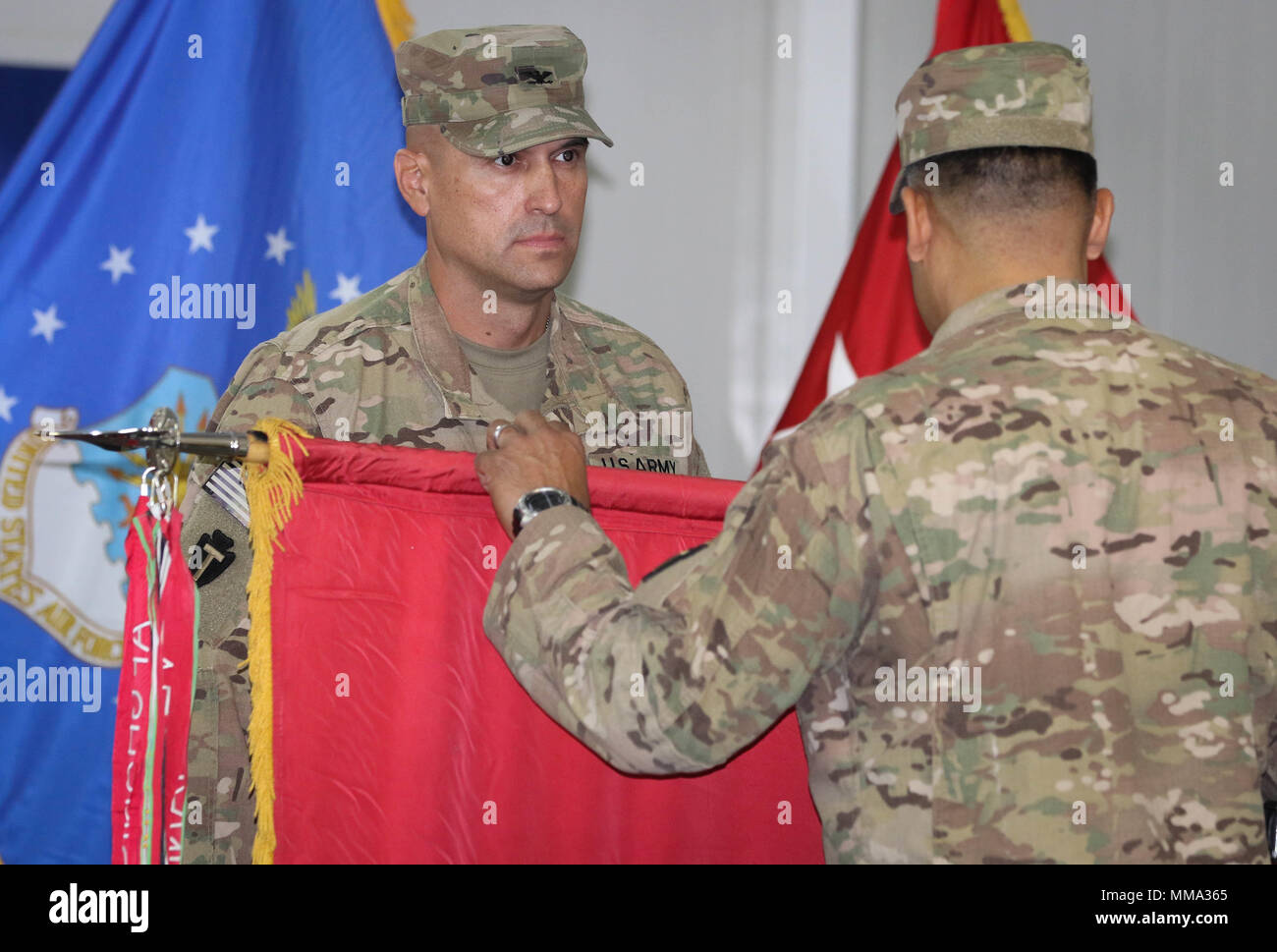U.S. Army Col. Brian P. Sullivan (left) and Command Sgt. Maj. Ronald ...