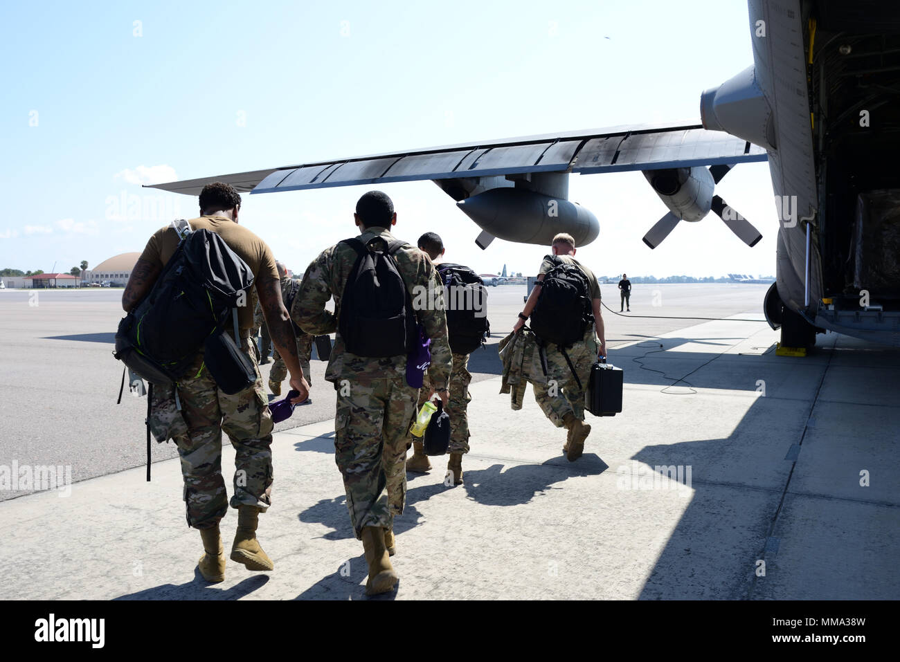 Service members from the 2nd Joint Communications Support Element board ...