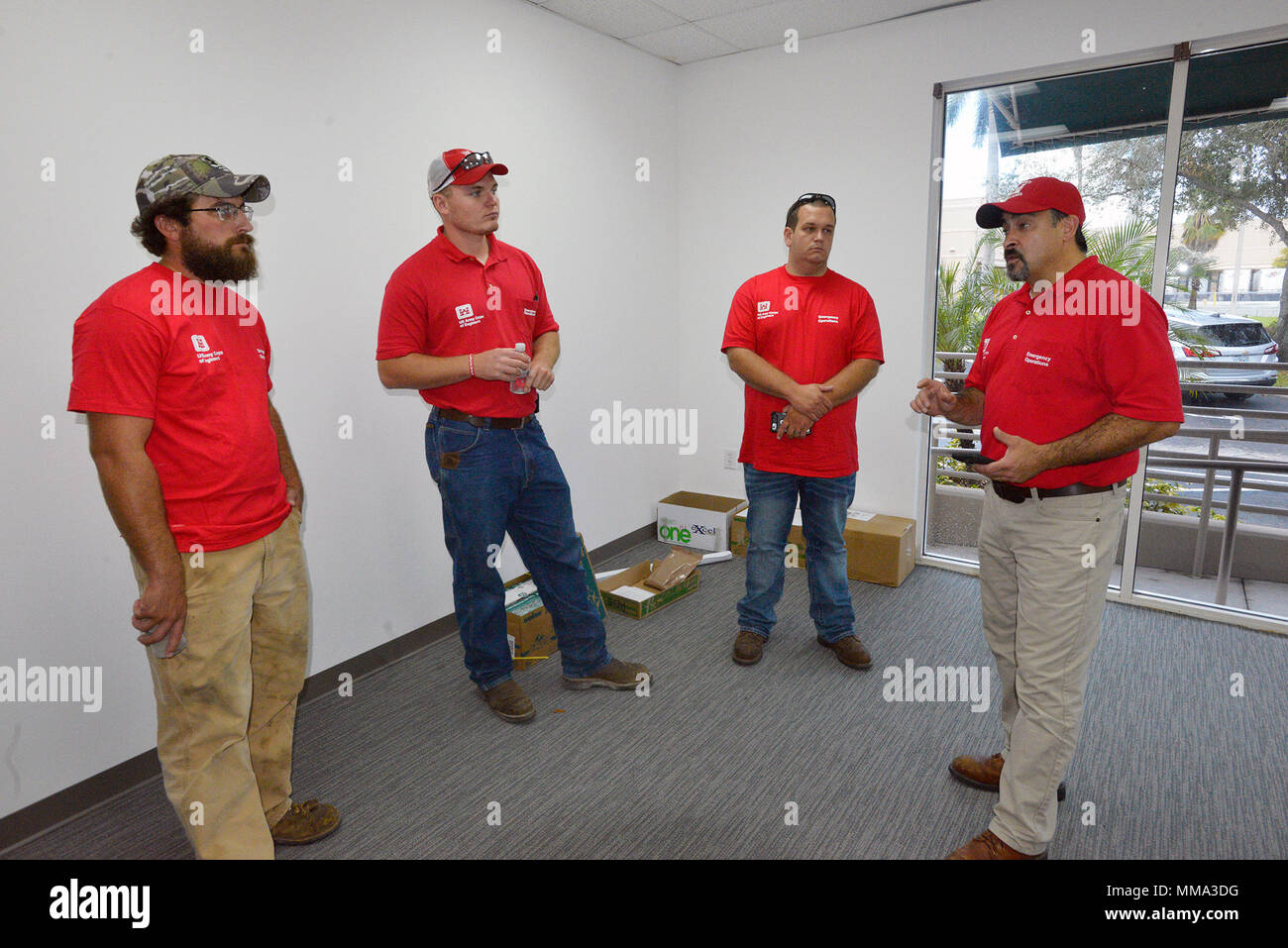 Kevin Salvilla, a Quality Assessment Inspector with USACE (Right) goes ...